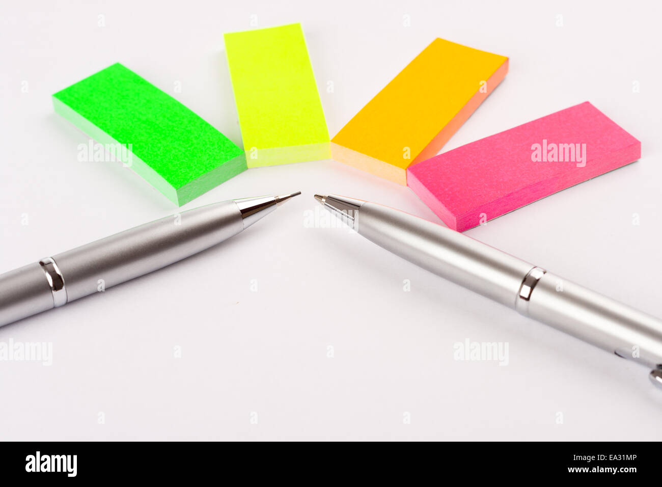 Postit and pens Stock Photo - Alamy