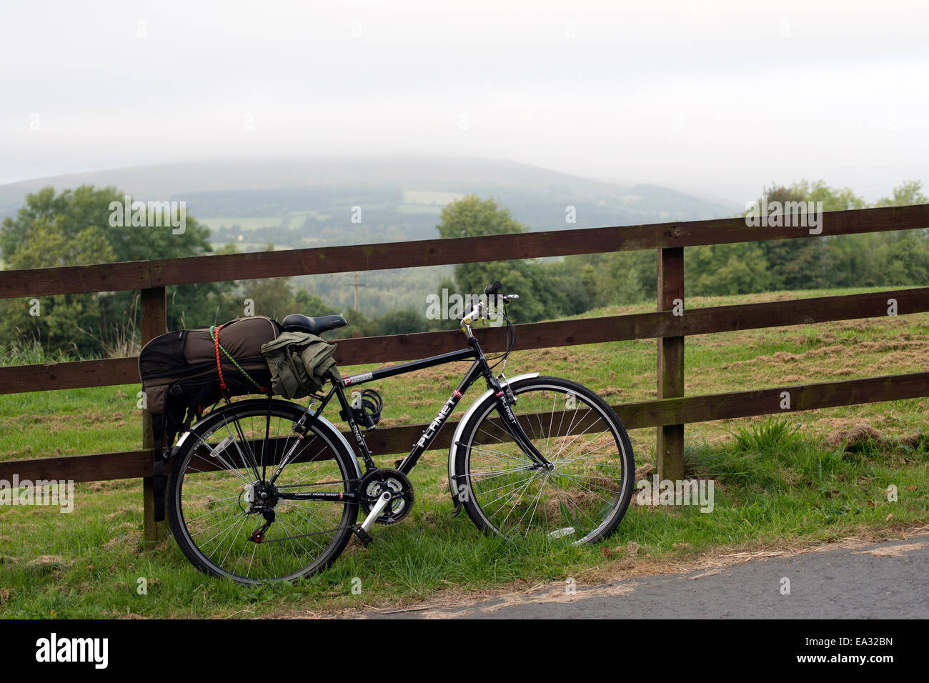 bicycle by the fence Stock Photo - Alamy