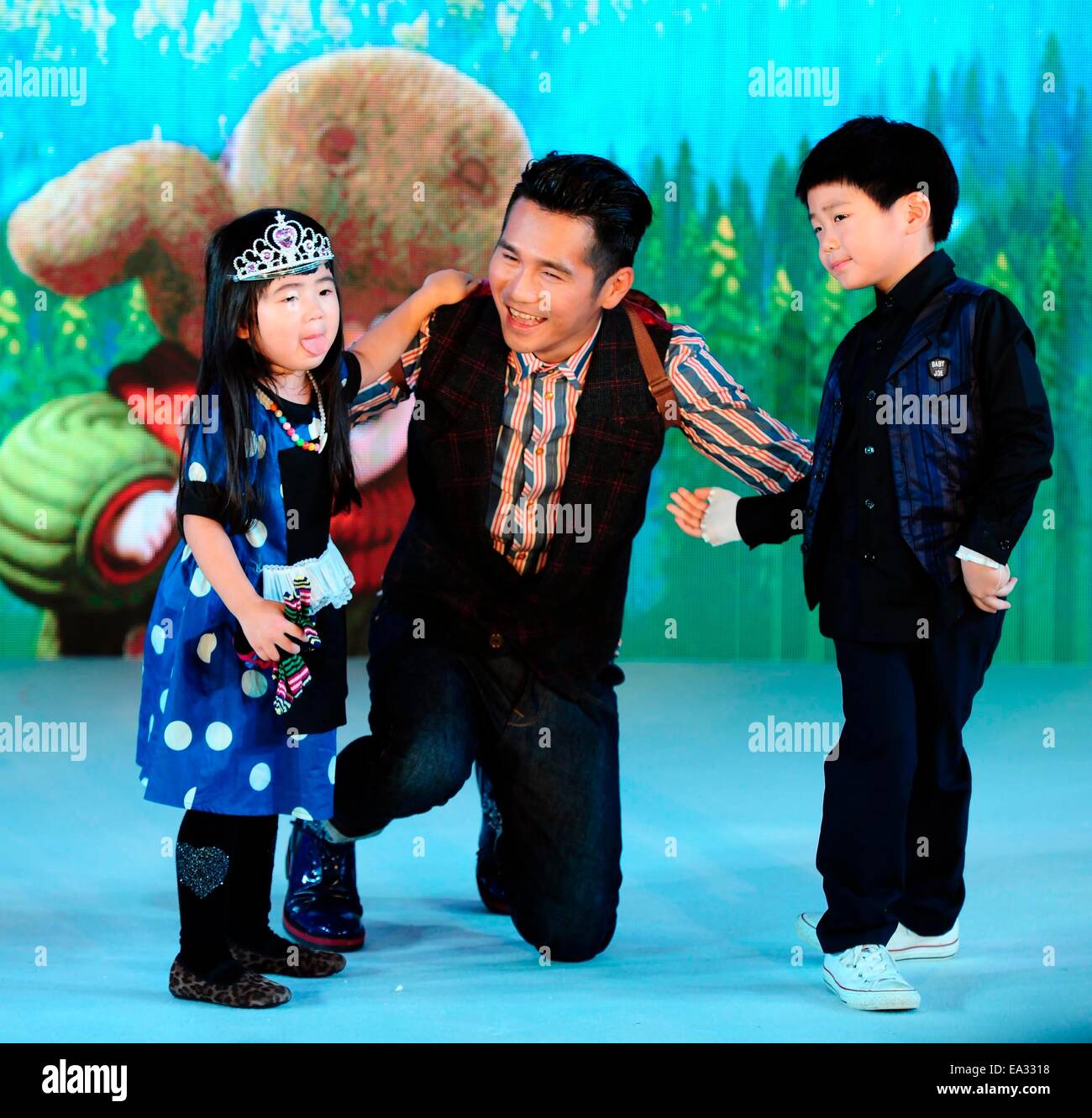Gary Cao brings his children Grace and Joe to the press conference of ...