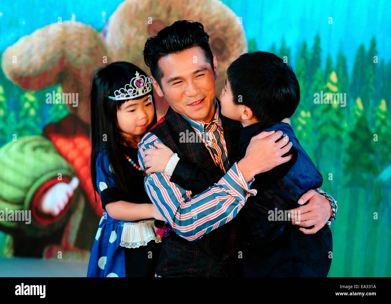 Gary Cao brings his children Grace and Joe to the press conference of ...