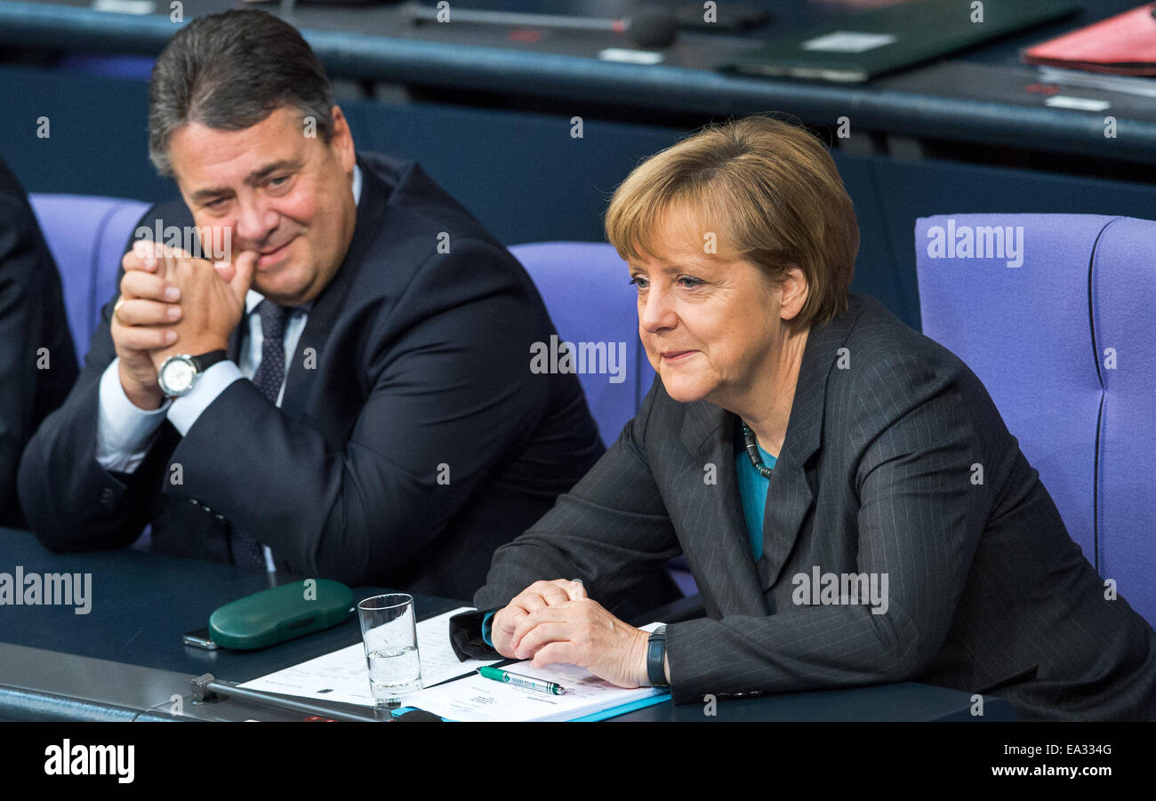 Berlin, Germany. 06th Nov, 2014. German Chancellor Angela Merkel (R ...