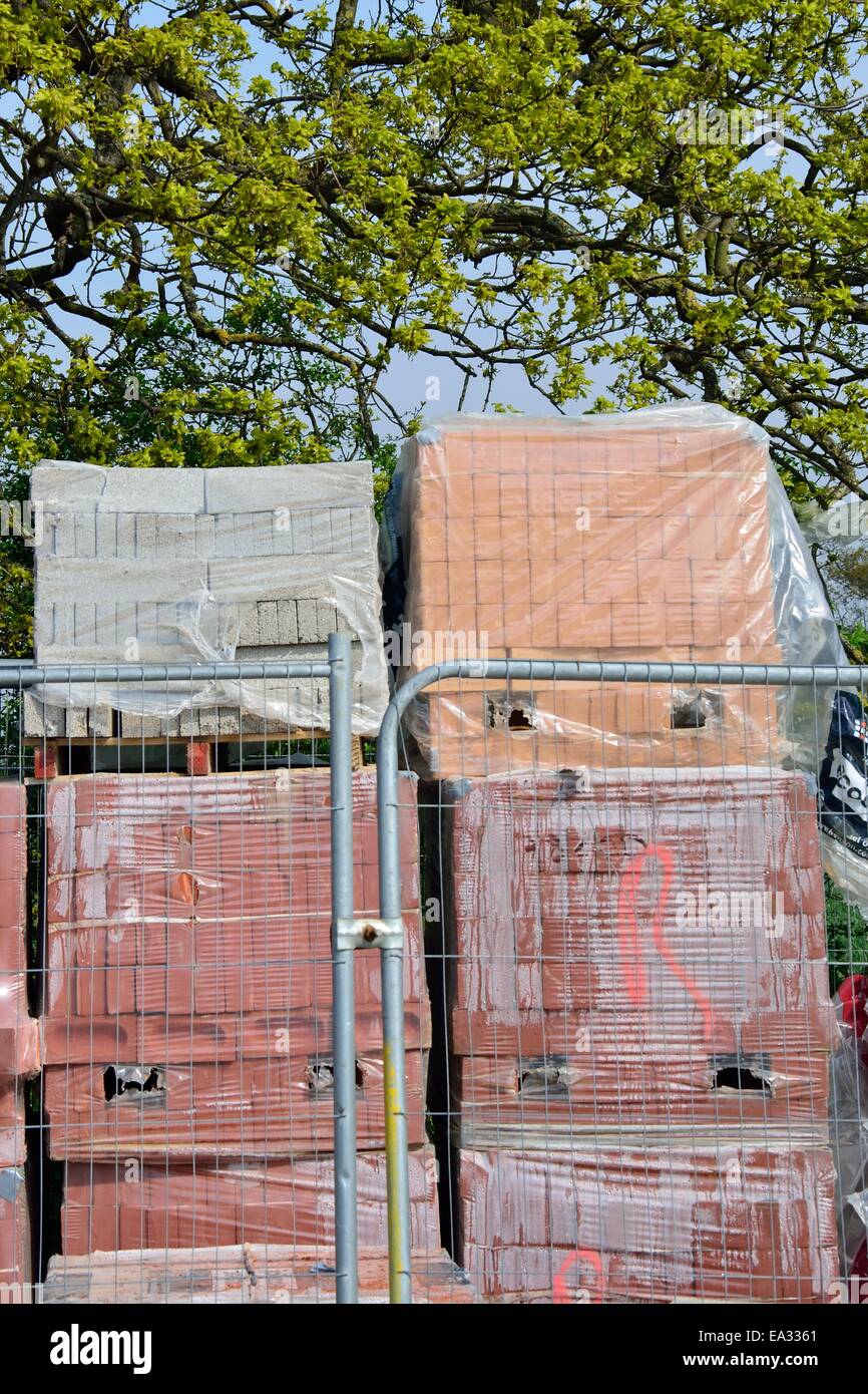 Stacked bricks on construction site hi-res stock photography and images ...