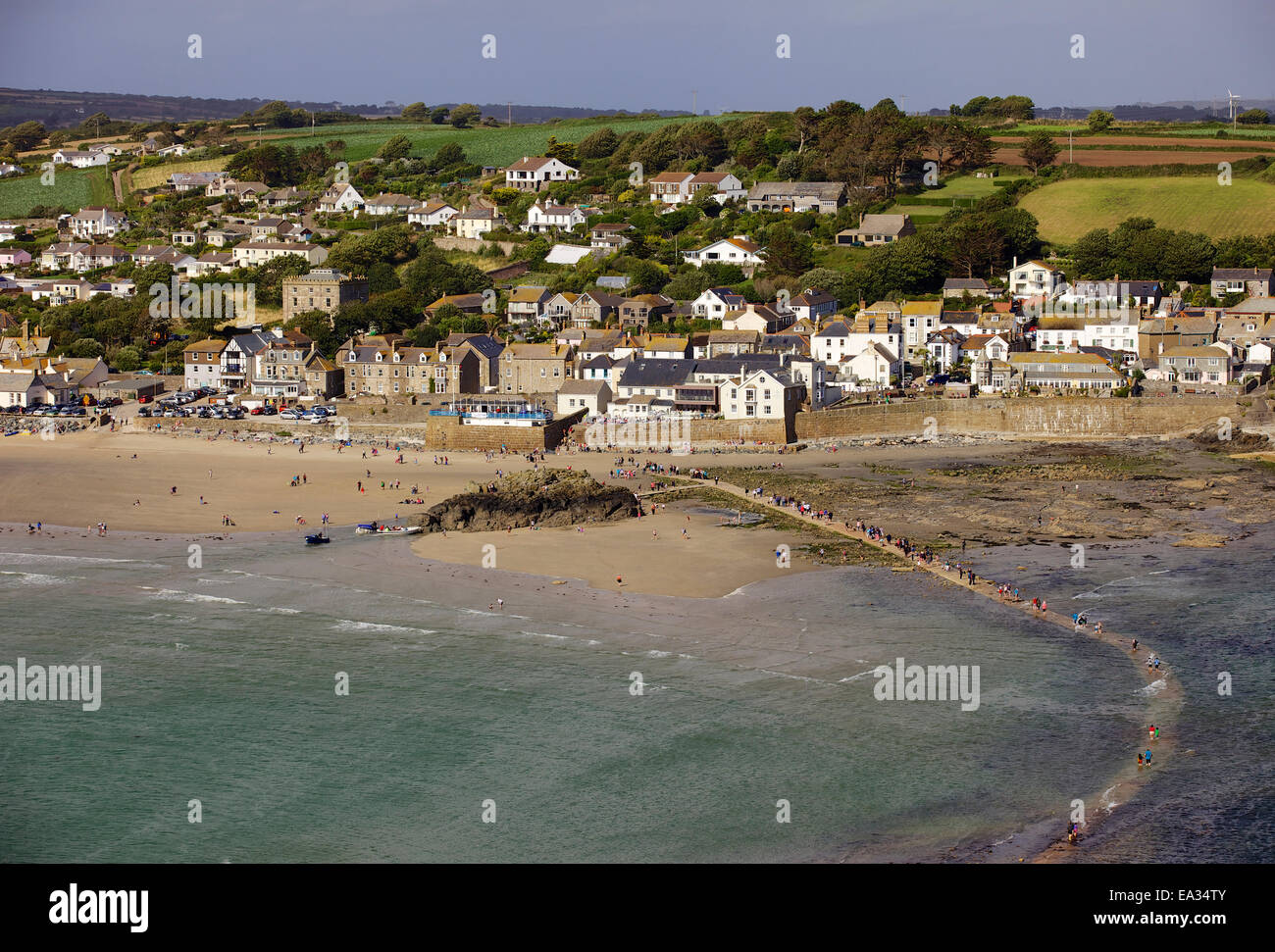 People crossing the tidal causeway from St. Michaels Mount to Marazion ...