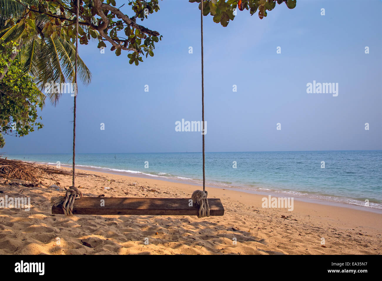 Swing on the beach Stock Photo - Alamy