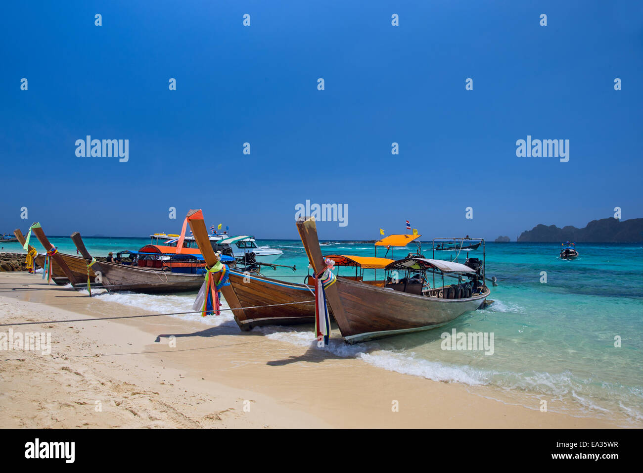 Thai longtail fishing boats hi-res stock photography and images - Alamy