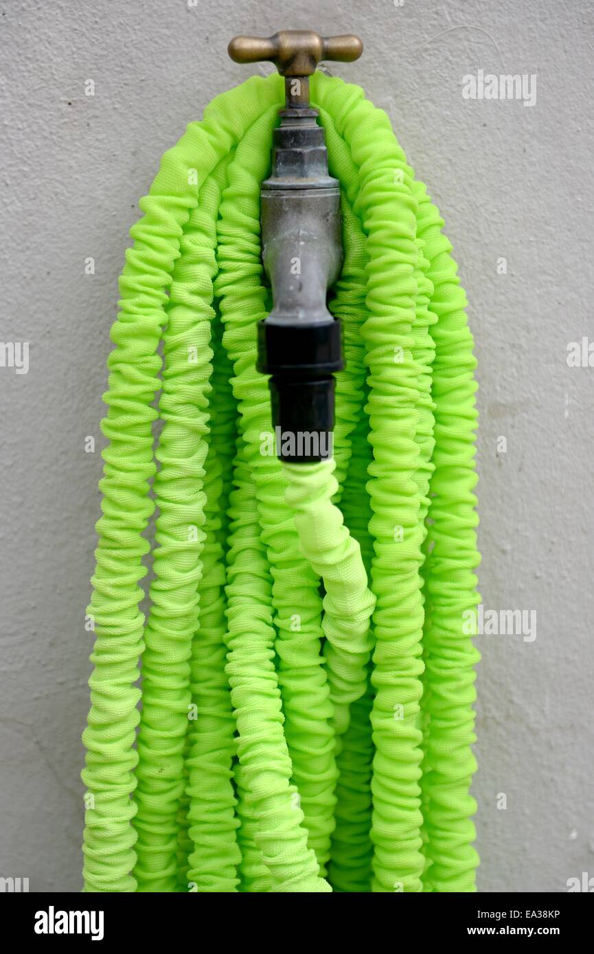 A close up image of a garden hose Stock Photo - Alamy