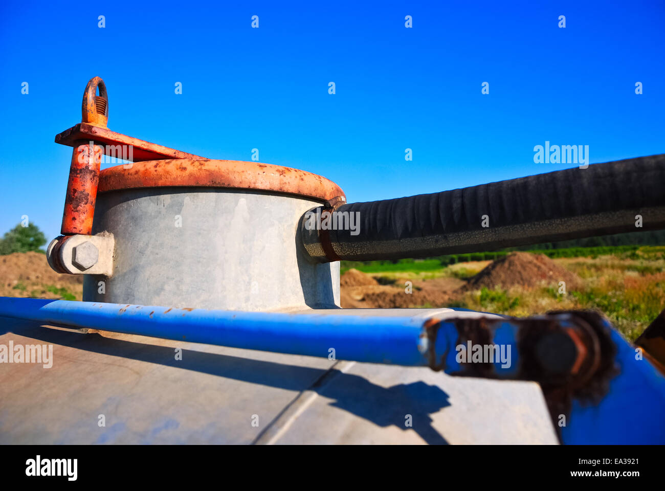 Closure and lid of a water tank Stock Photo - Alamy