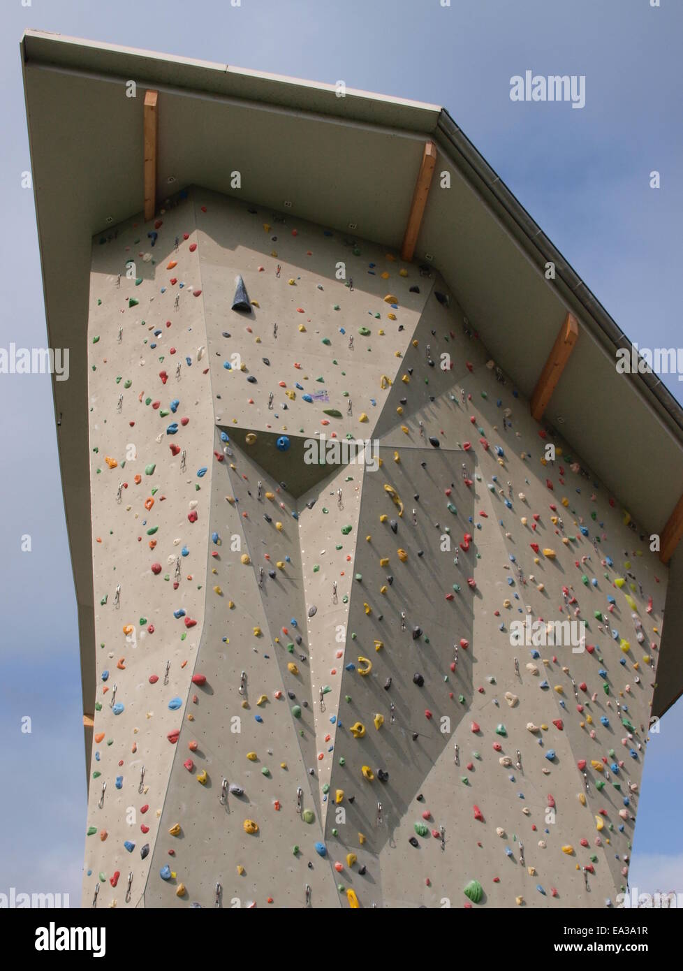 Climbing tower with climbing grips Stock Photo - Alamy