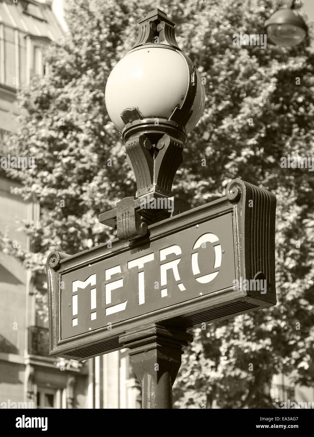 Street sign at the entrance to the Paris Metro, banner with text on the ...