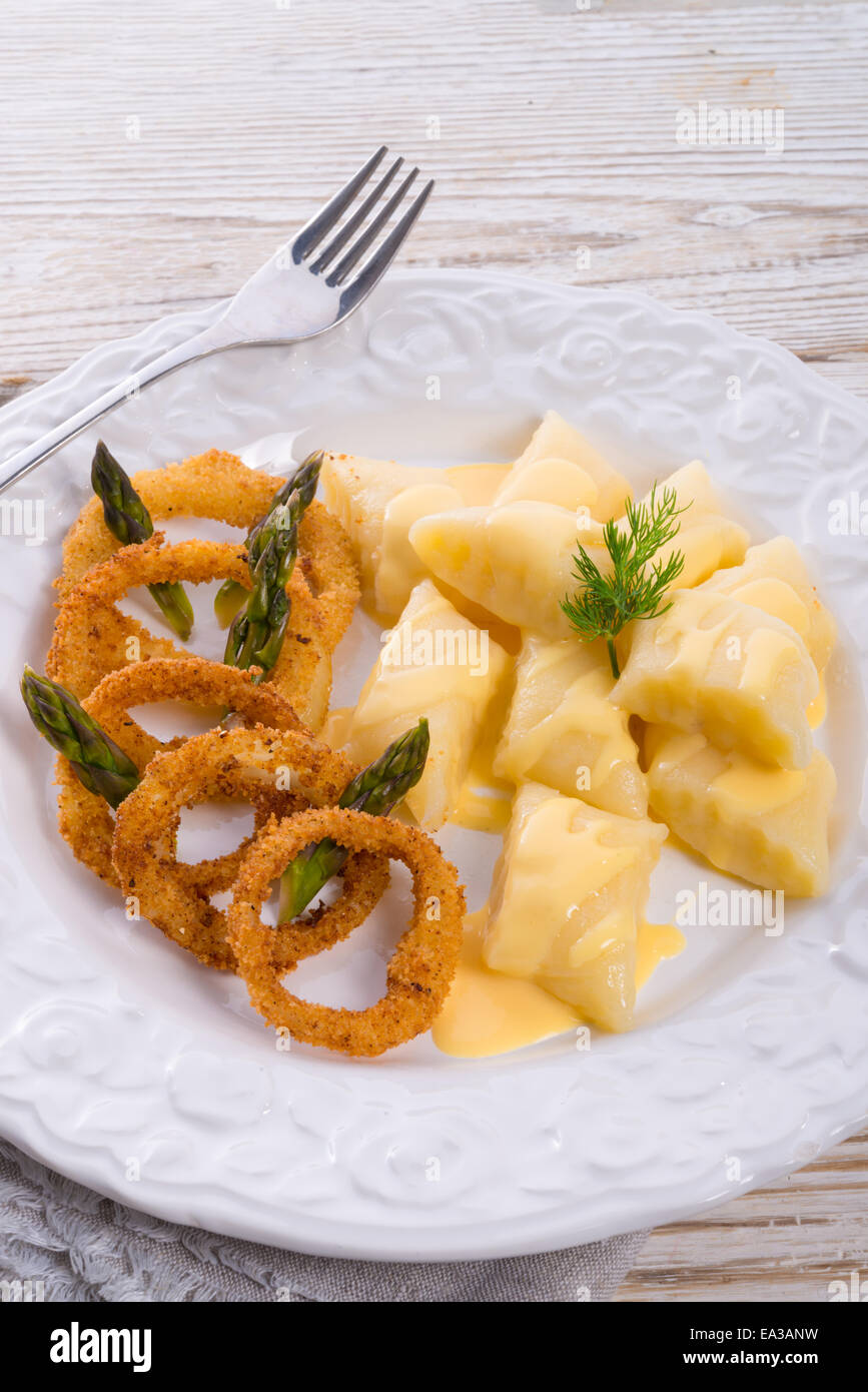 Onion ring white potato dumpling Stock Photo - Alamy