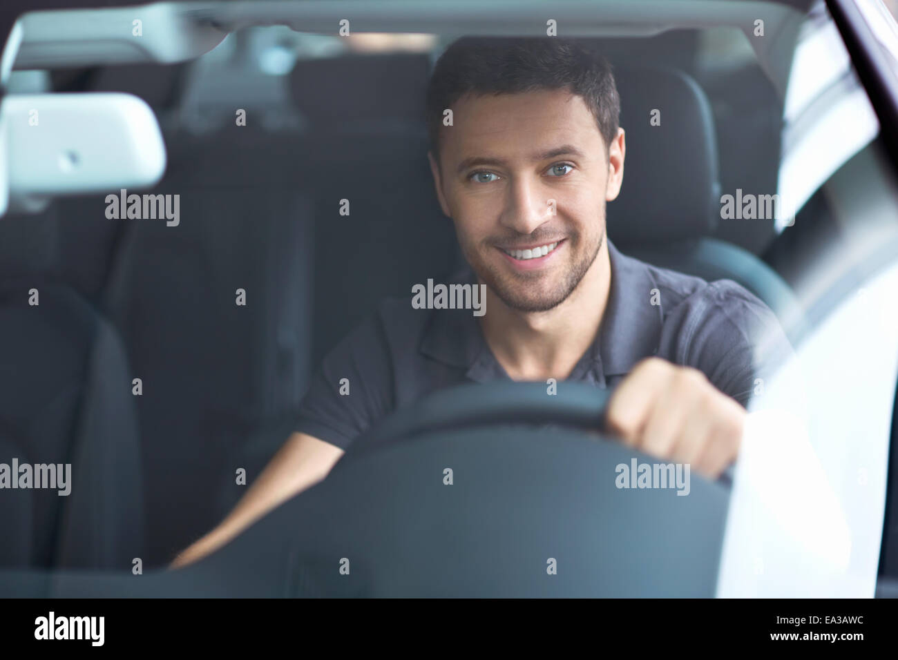 Behind the wheel Stock Photo - Alamy