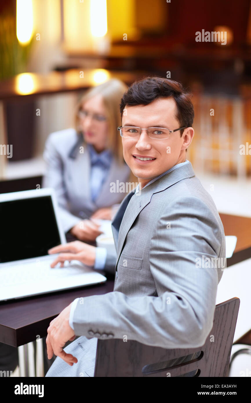 Mature smiling male staff hi-res stock photography and images - Alamy
