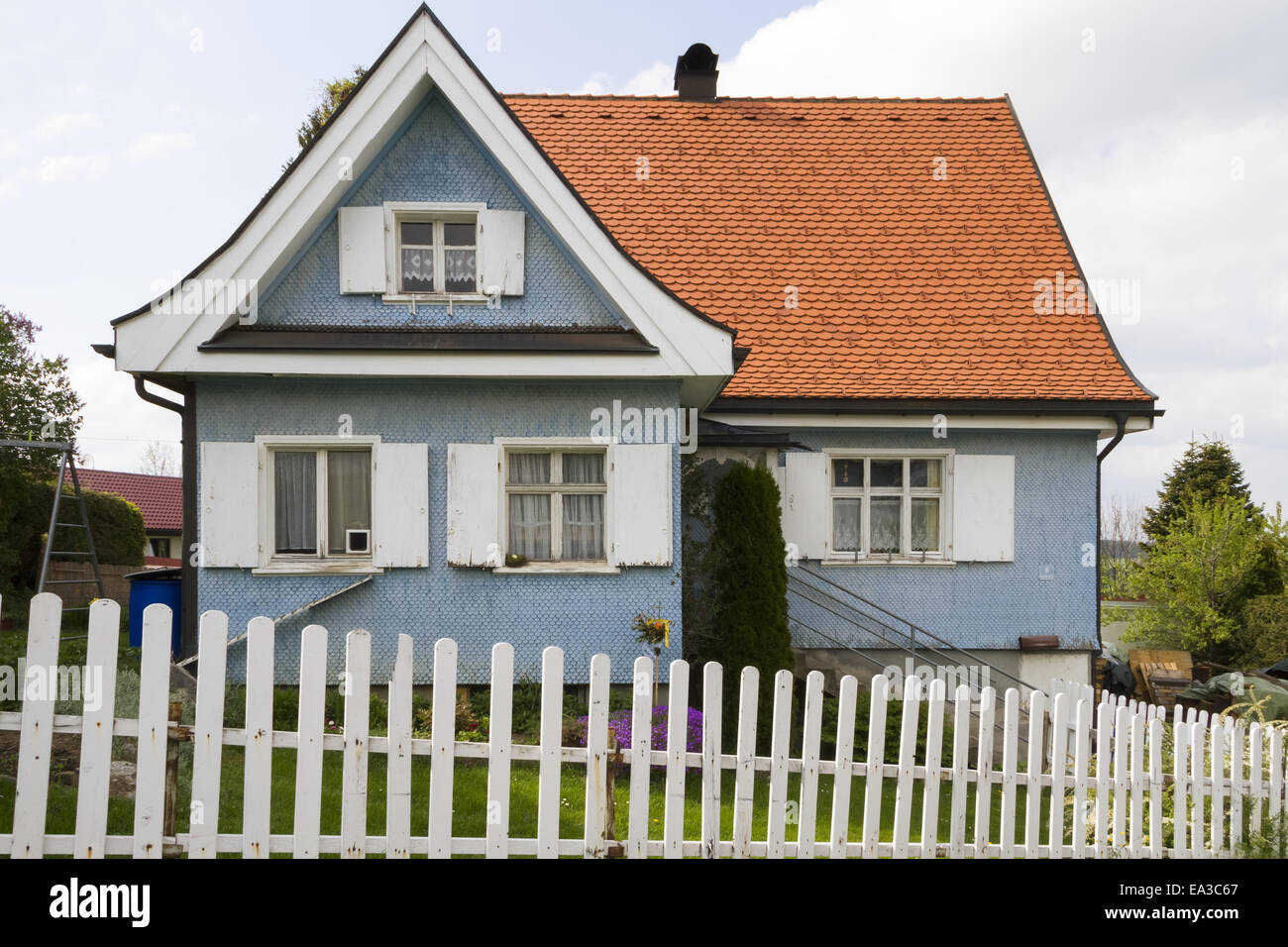 house with fence Stock Photo - Alamy