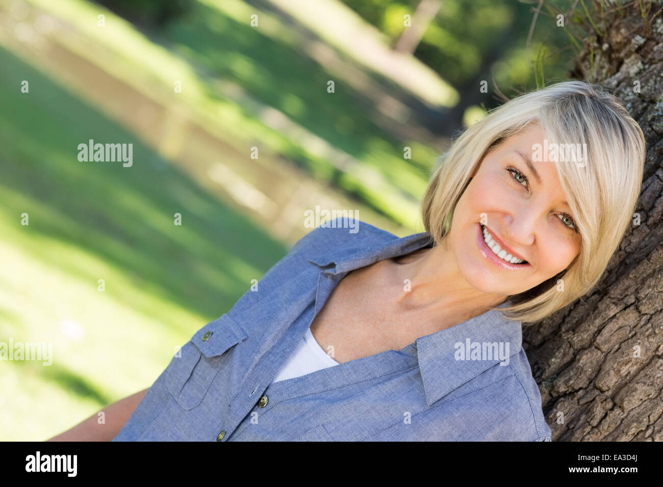 Beautiful woman in park Stock Photo - Alamy
