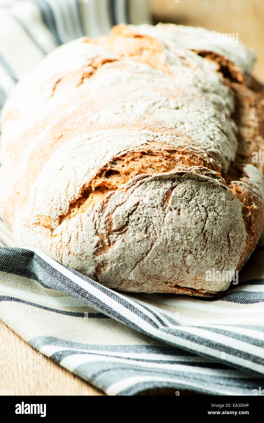 Large loaf of bread vertical Stock Photo - Alamy