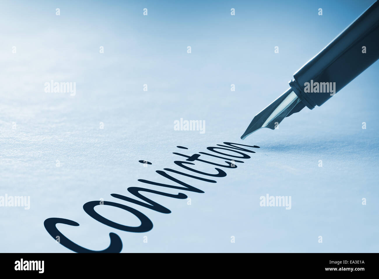 Fountain pen writing Conviction Stock Photo - Alamy