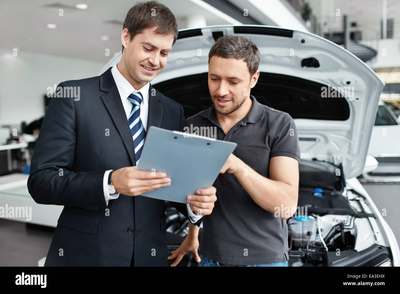 Young black man buying car hi-res stock photography and images - Alamy