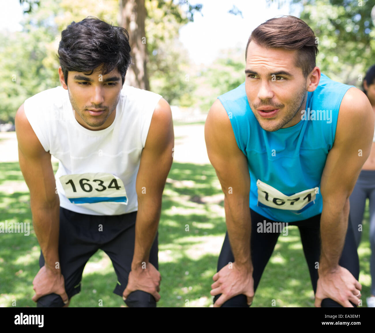 Tired marathon runners in park Stock Photo - Alamy