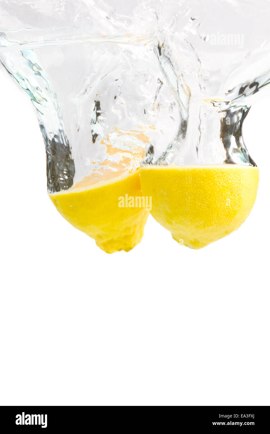 Lemon with water splash Stock Photo - Alamy