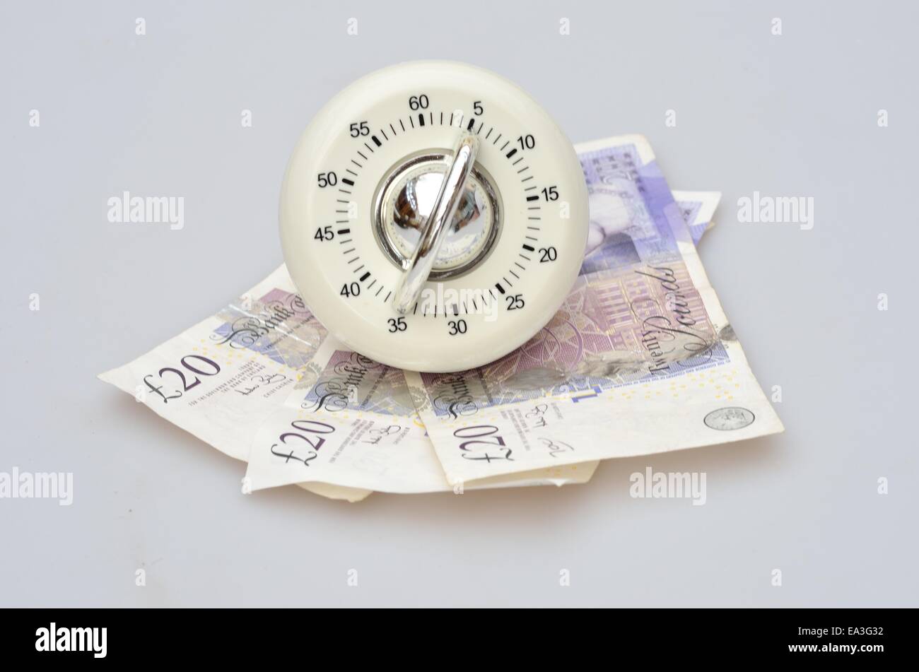 Timer over notes Stock Photo - Alamy