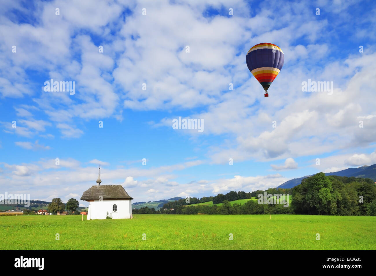 Balloon over the lovely chapel Stock Photo - Alamy