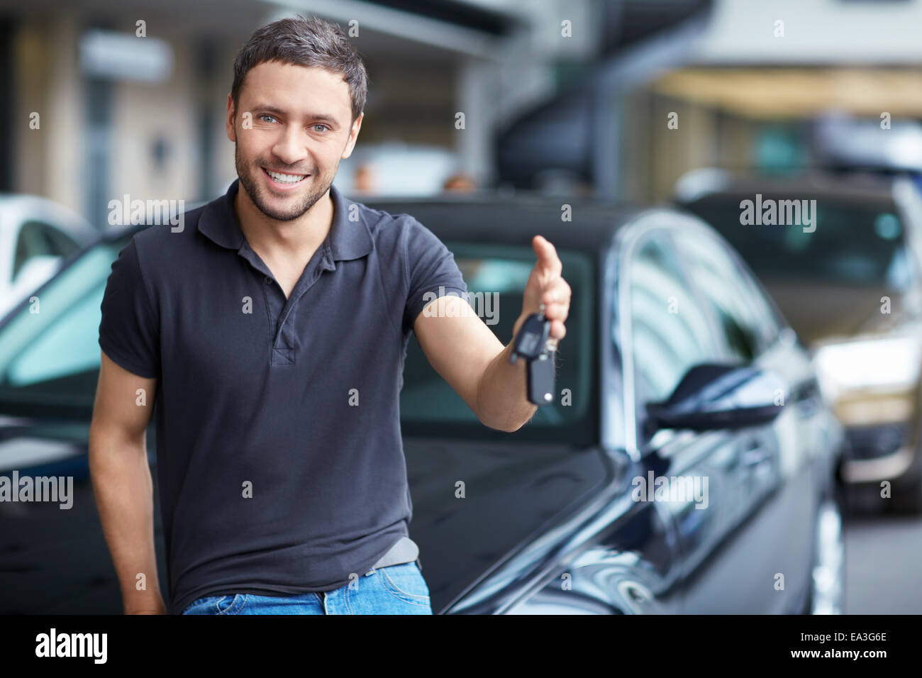 Man with car keys Stock Photo - Alamy