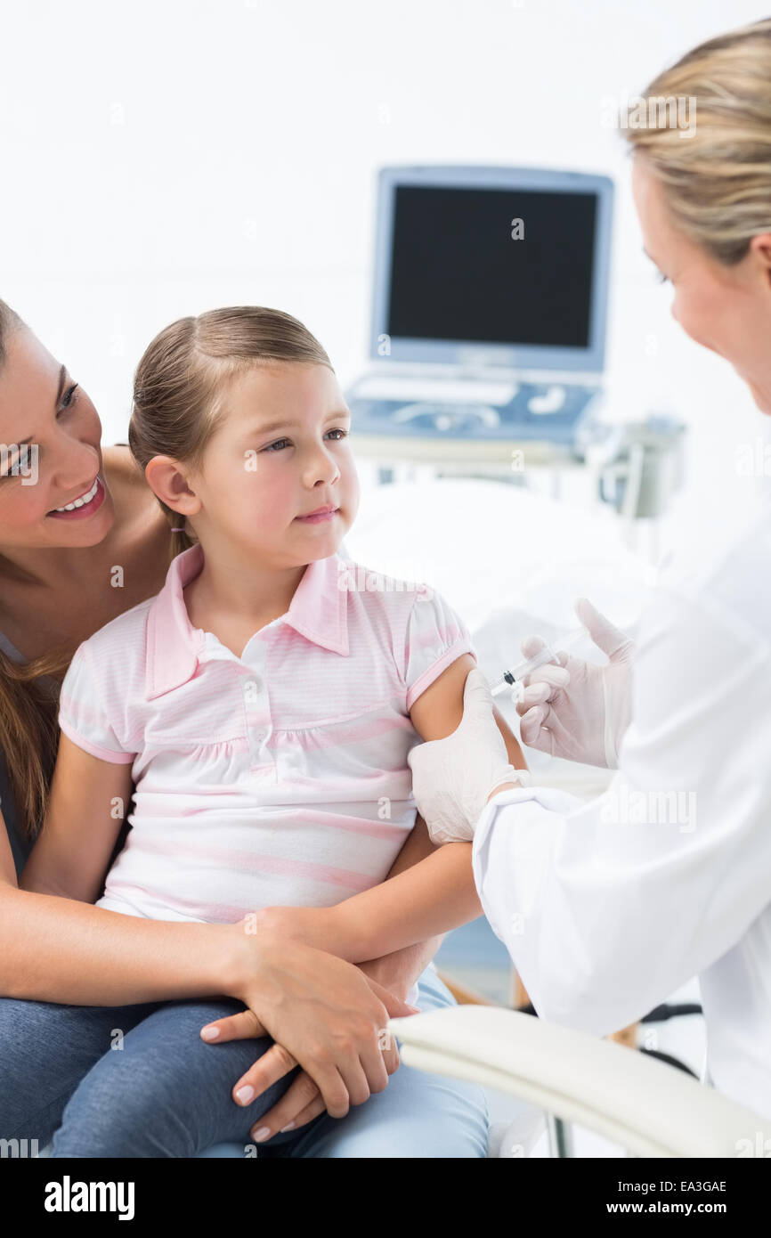 Pediatrician girl injection hi-res stock photography and images - Alamy