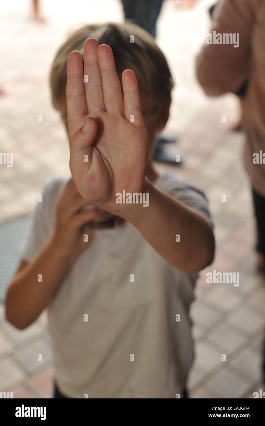 Boy saying stop Stock Photo - Alamy
