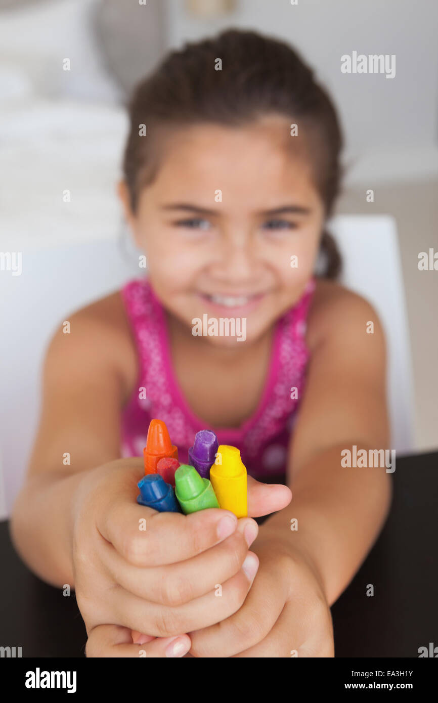 Child sitting holding up drawing hi-res stock photography and images ...