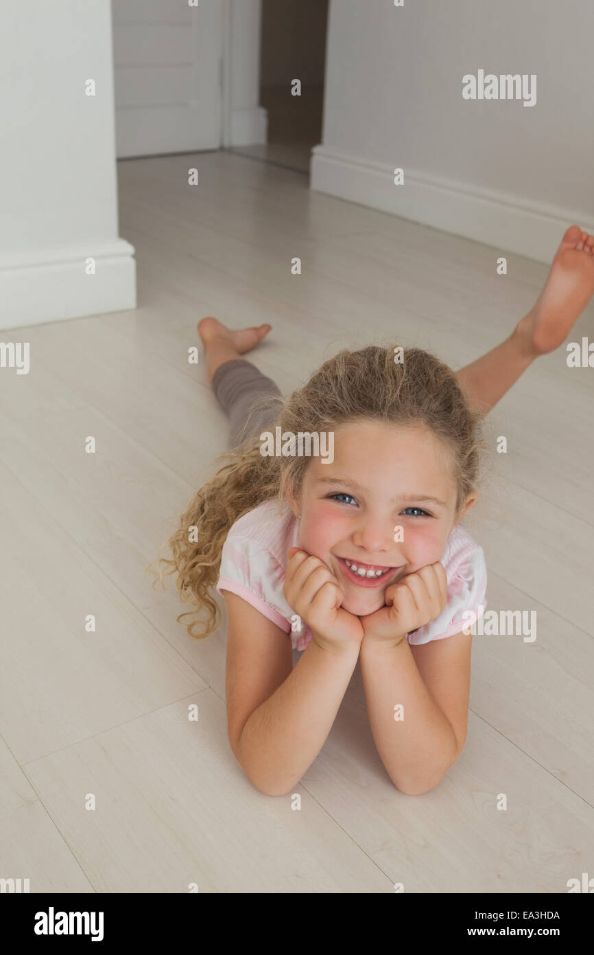 Girl lying on floor hi-res stock photography and images - Alamy