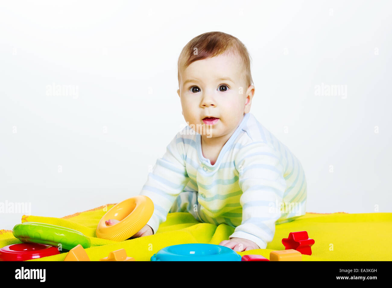 Little baby boy with toys Stock Photo - Alamy
