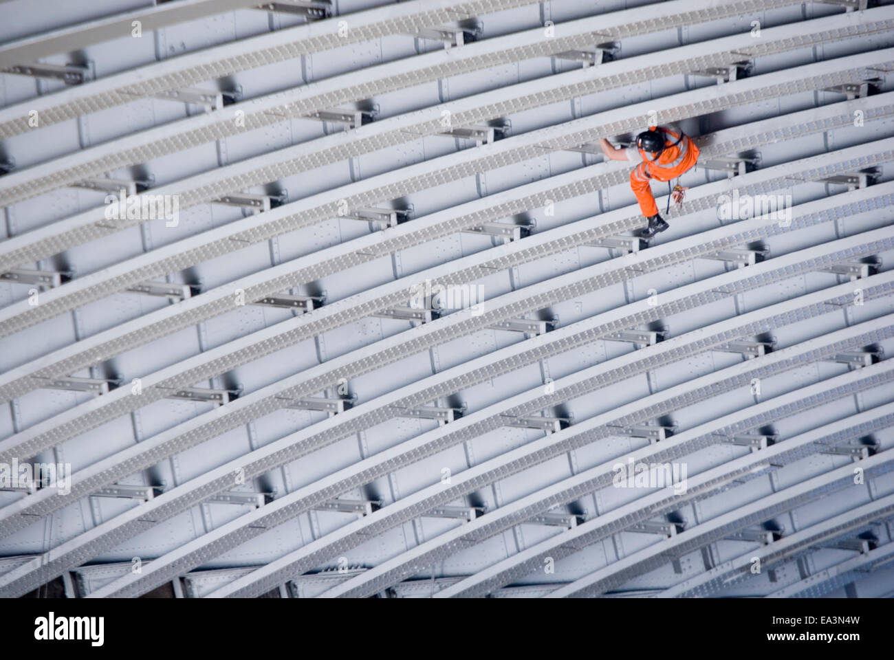 London 20 Aug 2013 : Workman hanging beneath Blackfriars Bridge ...