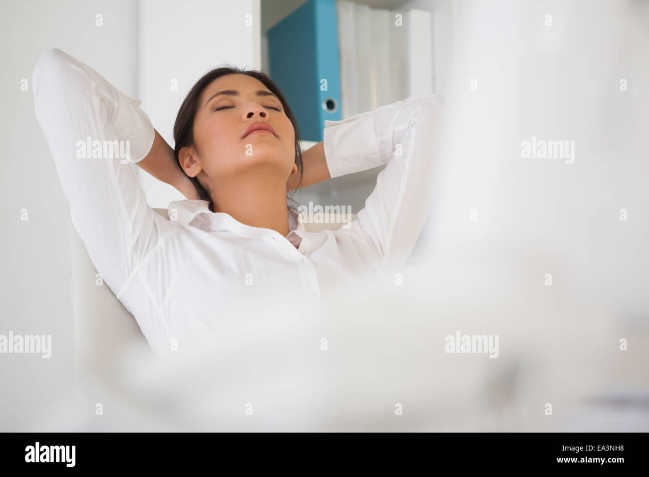 Casual businesswoman napping at her desk Stock Photo - Alamy