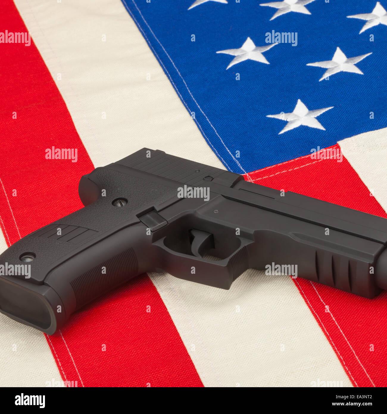 Handgun and USA flag Stock Photo - Alamy