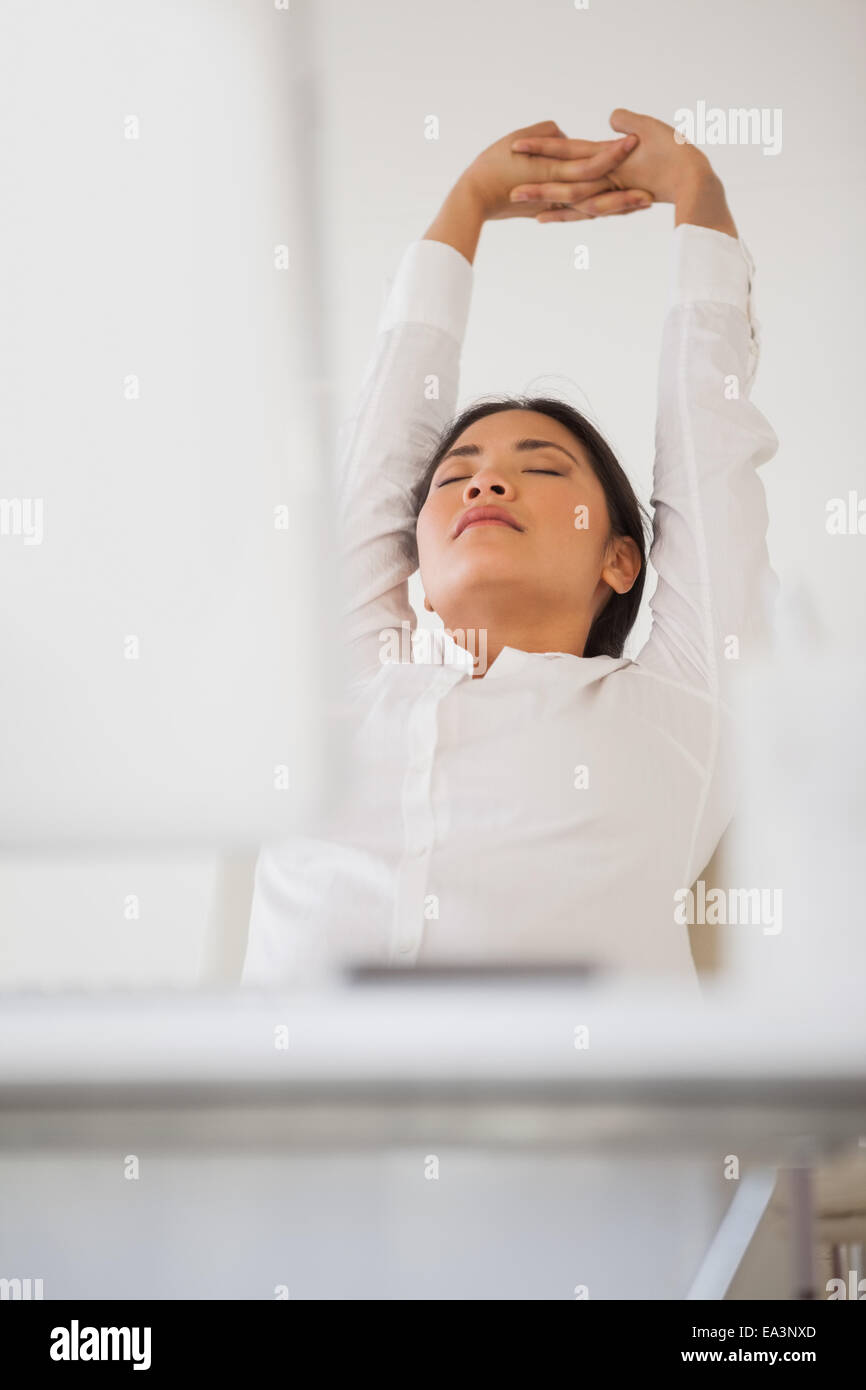 Casual businesswoman napping at her desk Stock Photo - Alamy