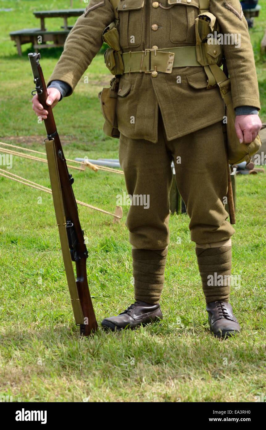 Soldier Standing At Attention With Gun
