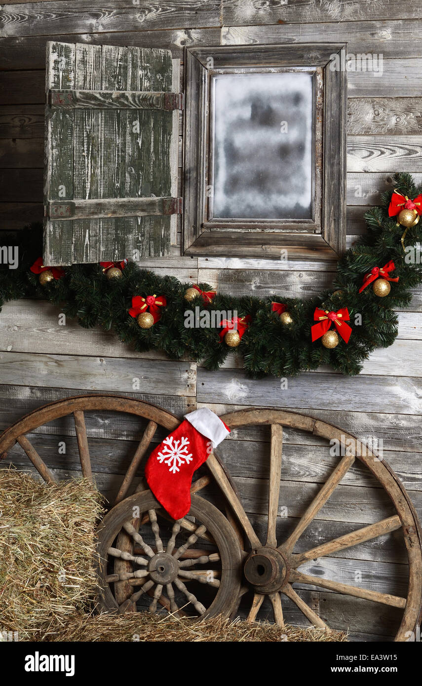 Christmas branch of a fur-tree on a wall Stock Photo - Alamy
