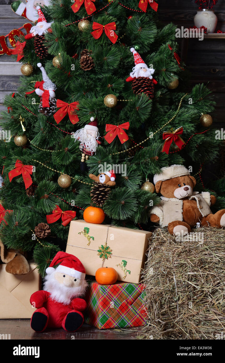 Christmas fur-tree in a rural interior Stock Photo - Alamy