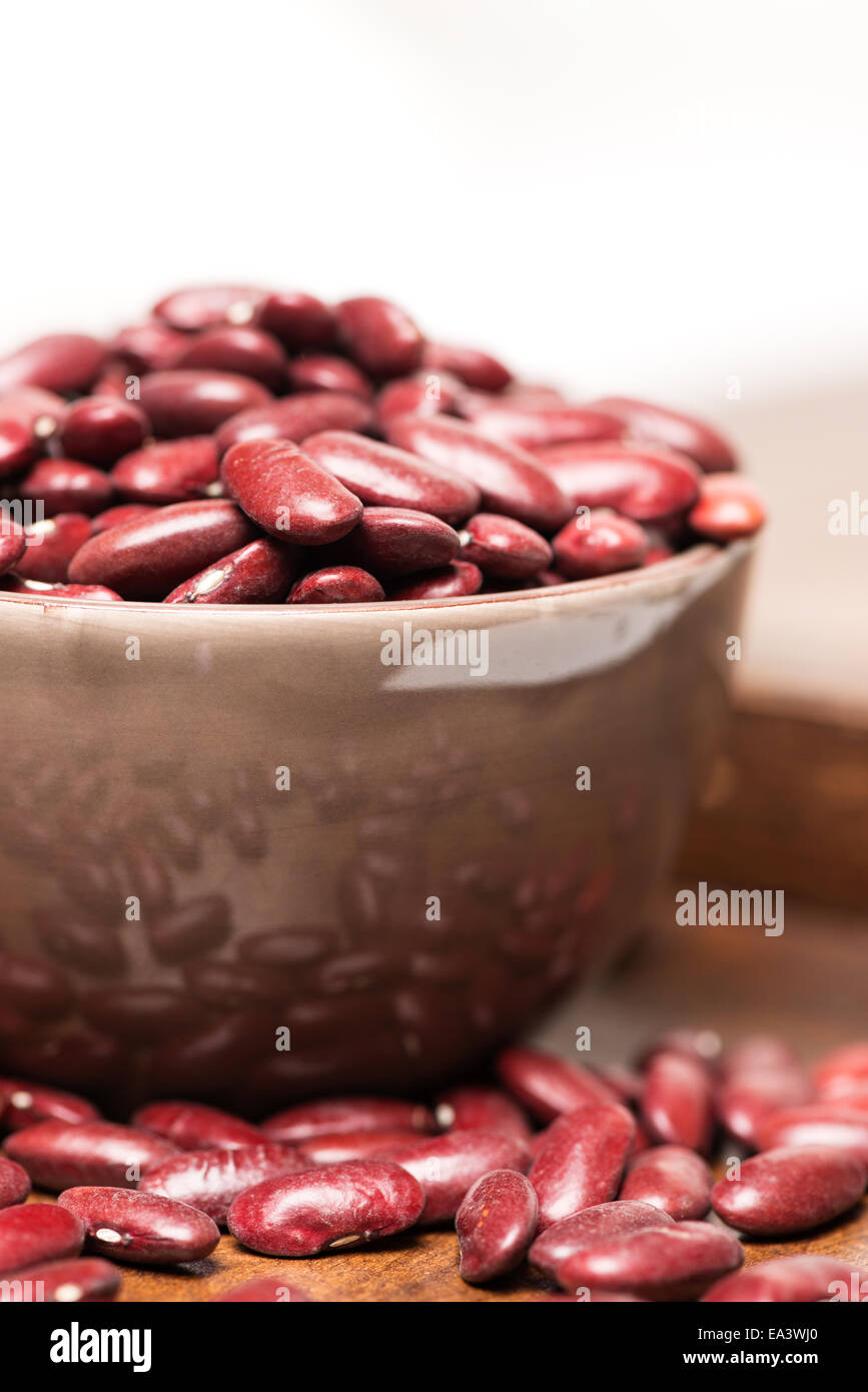 Bowl with raw red beans close up vertical Stock Photo - Alamy