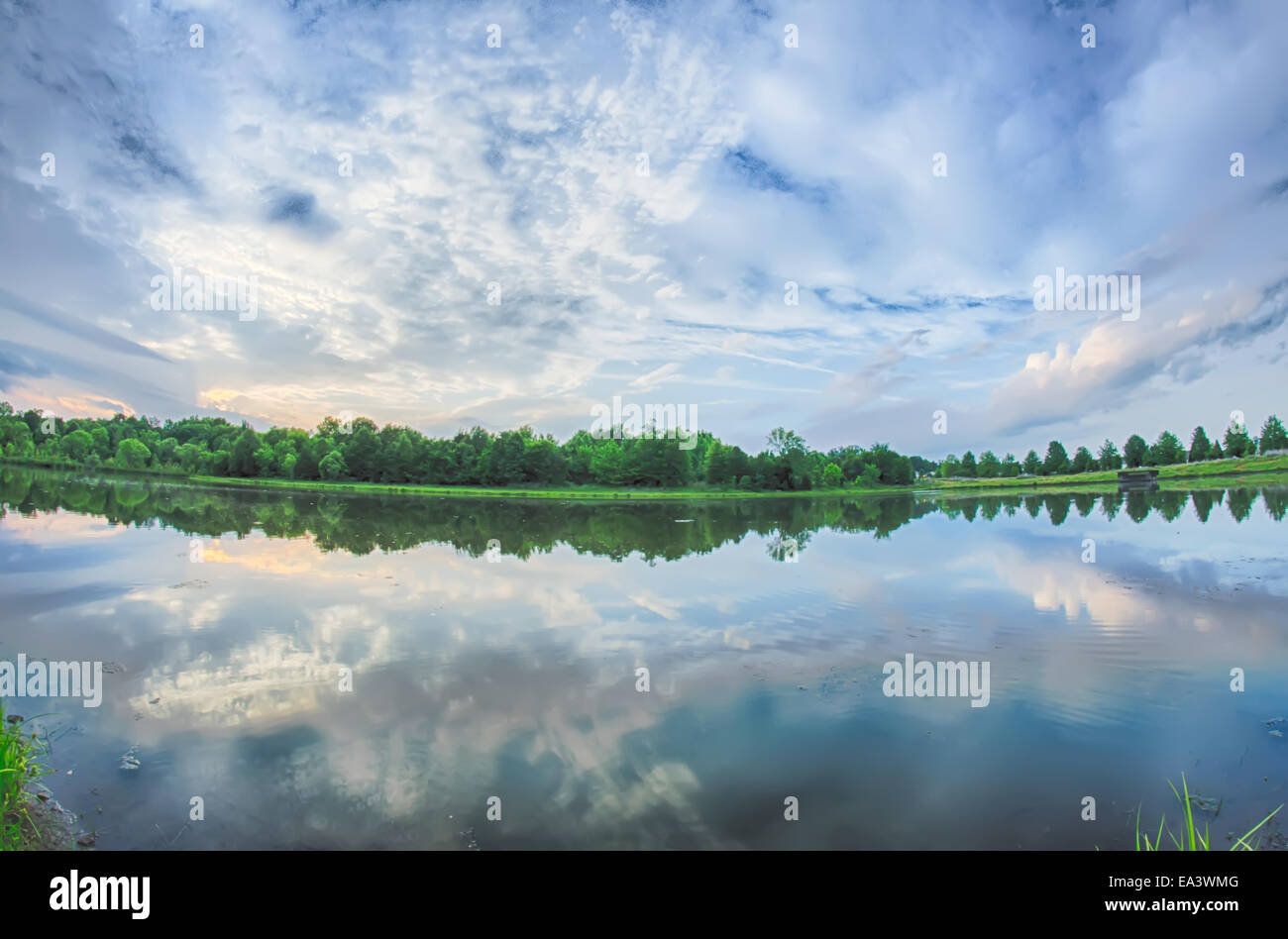 Sun setting over water mountains hi-res stock photography and images ...