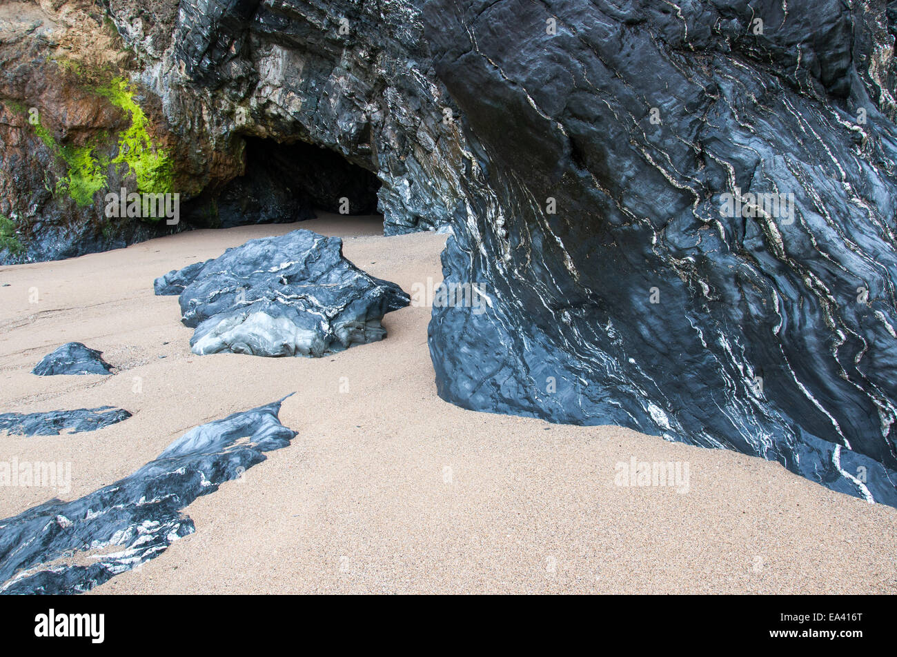Cave on Holywell Bay beach in North Cornwall Stock Photo - Alamy