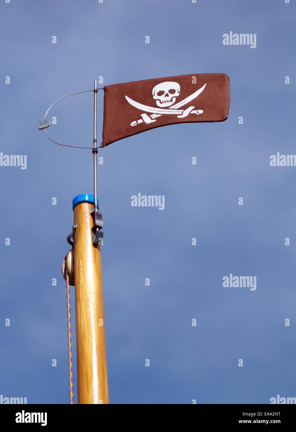 Jolly Roger skull and crossbones pirate flag Stock Photo - Alamy
