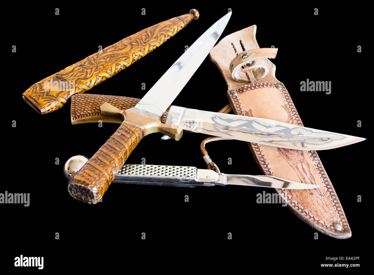 Cold weapon on black background Stock Photo - Alamy