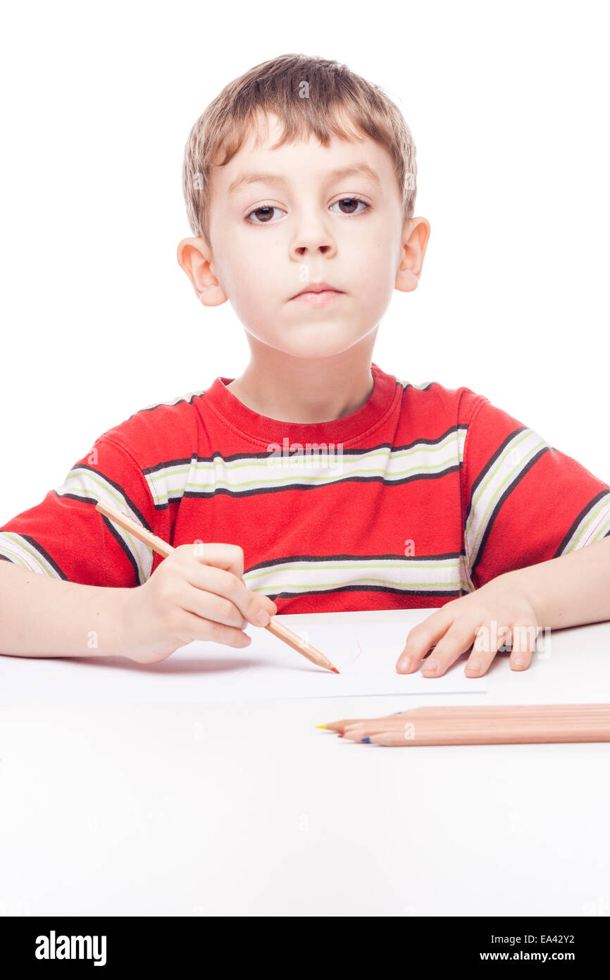 Boy at table Stock Photo - Alamy