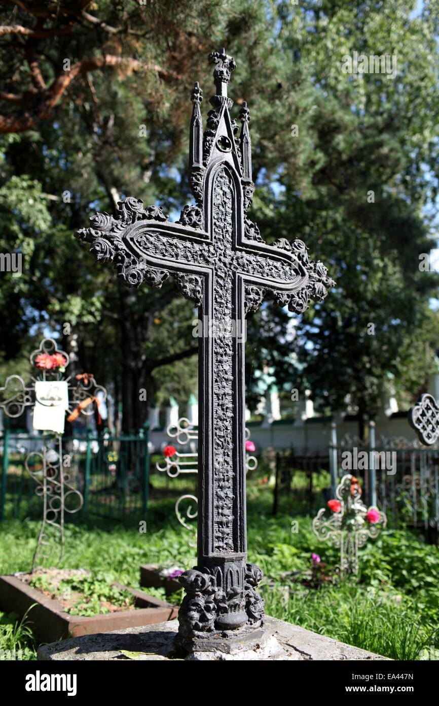 old cast iron tombstone gothic cross Stock Photo - Alamy