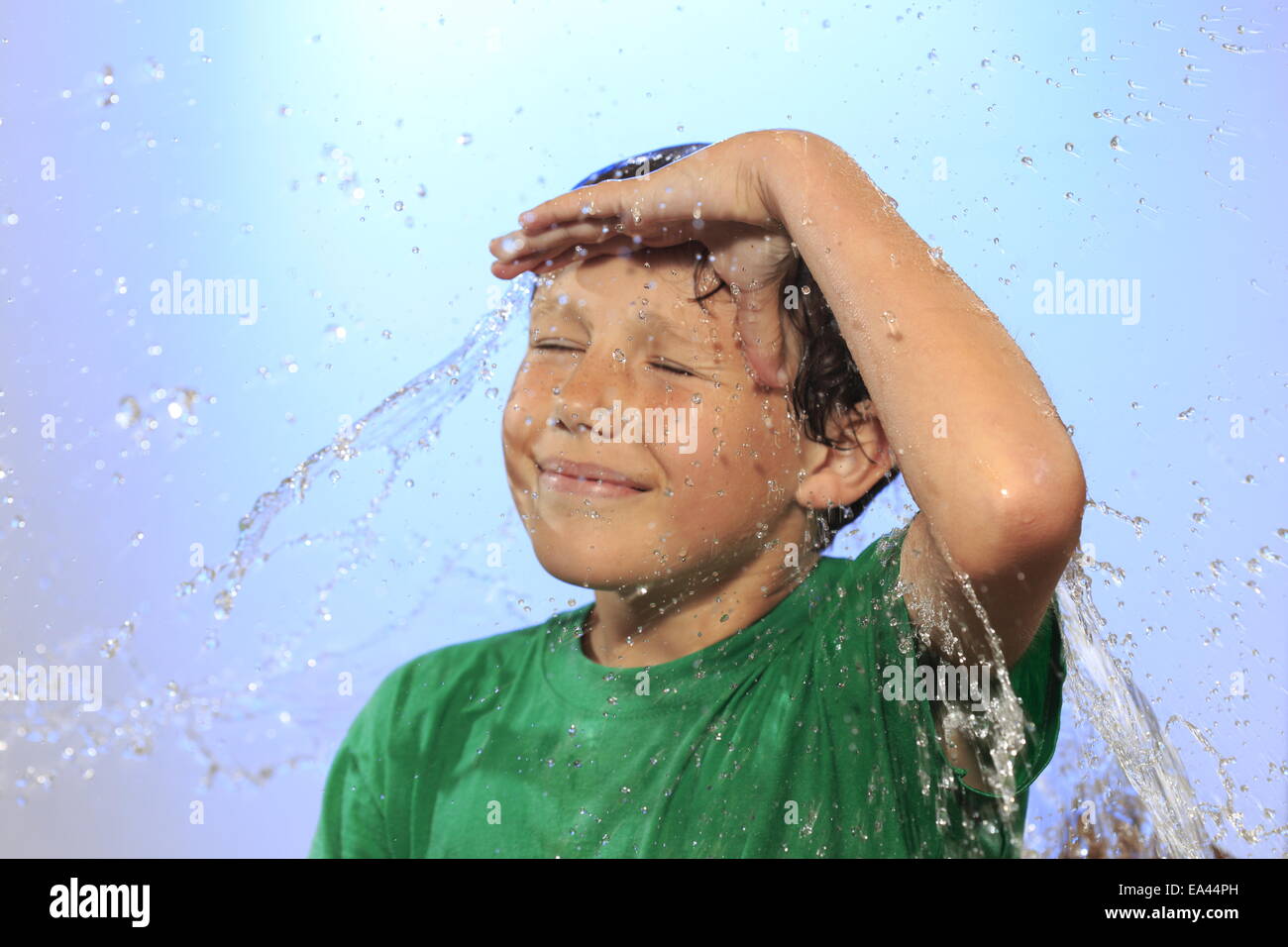 Child hand water drops hi-res stock photography and images - Alamy
