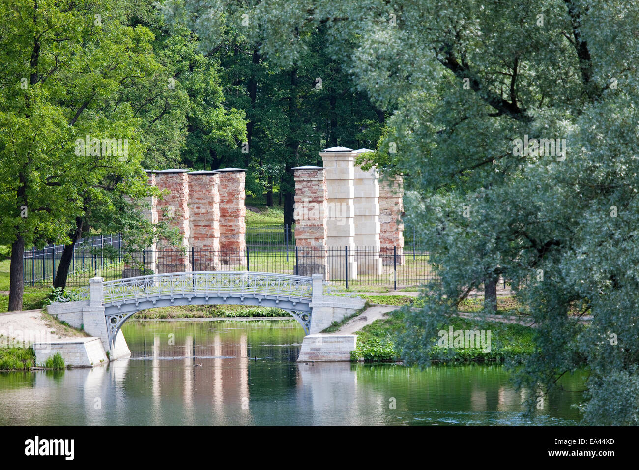The small bridge in park over a pond Stock Photo - Alamy