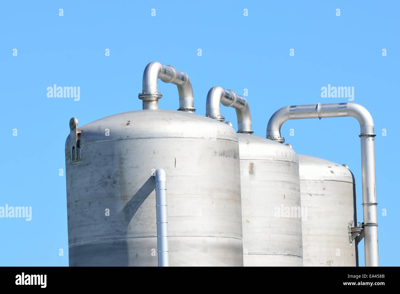 Three steel tanks Stock Photo - Alamy