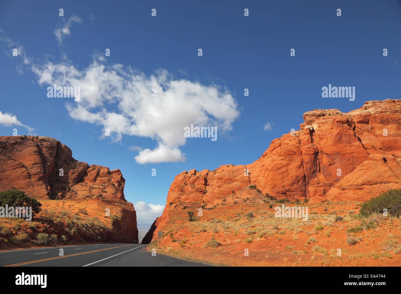 Magnificent road among red rocks Stock Photo - Alamy