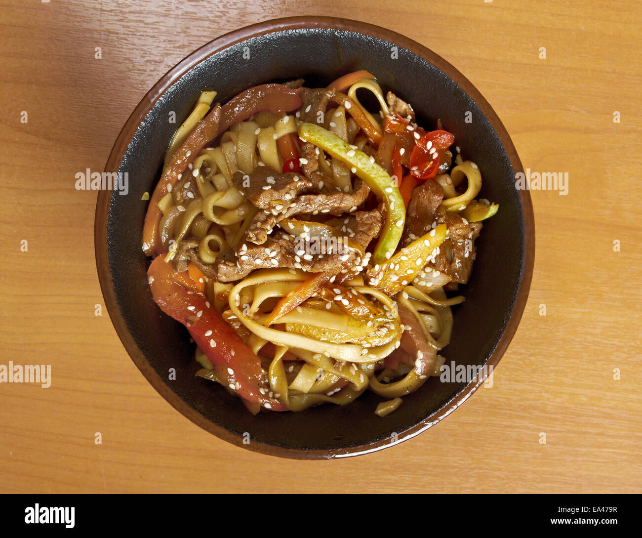 Cooking udon teppanyaki with pork Stock Photo - Alamy